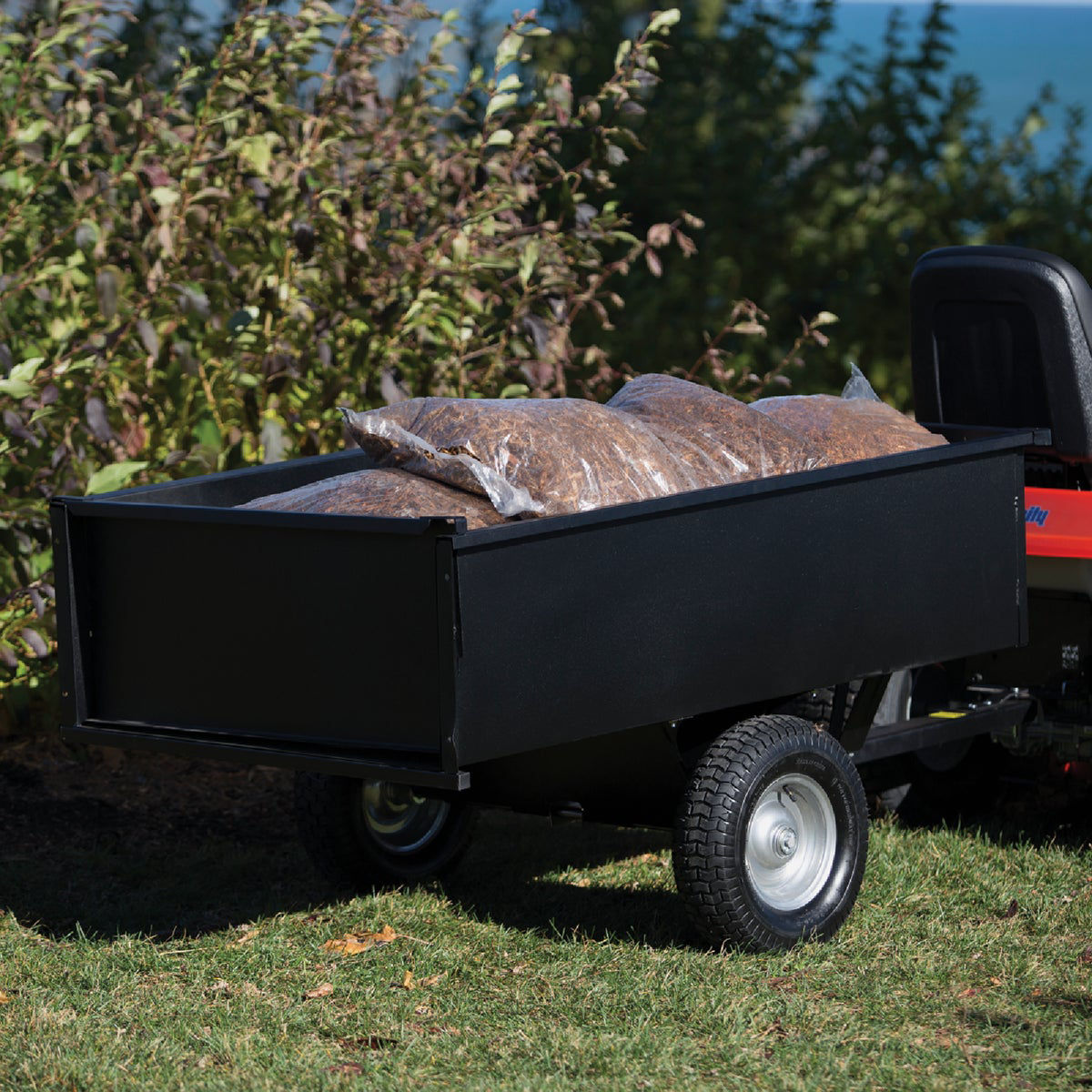 Milwaukee 17 Cu. Ft. 1500 Lb. Steel Tow-Behind Garden Cart | Do it Best